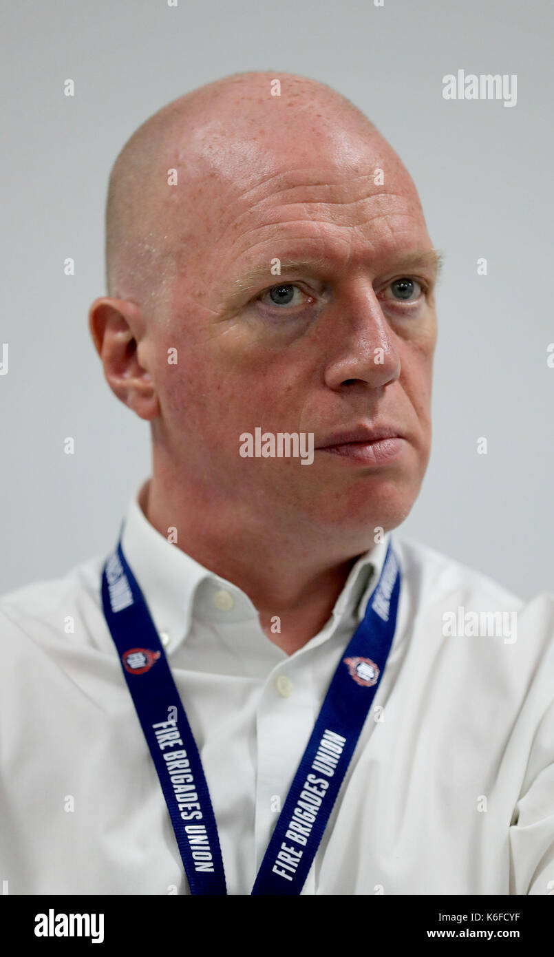 Matt Wrack, General Secretary of the Fire Brigades Union, speaks at a ...