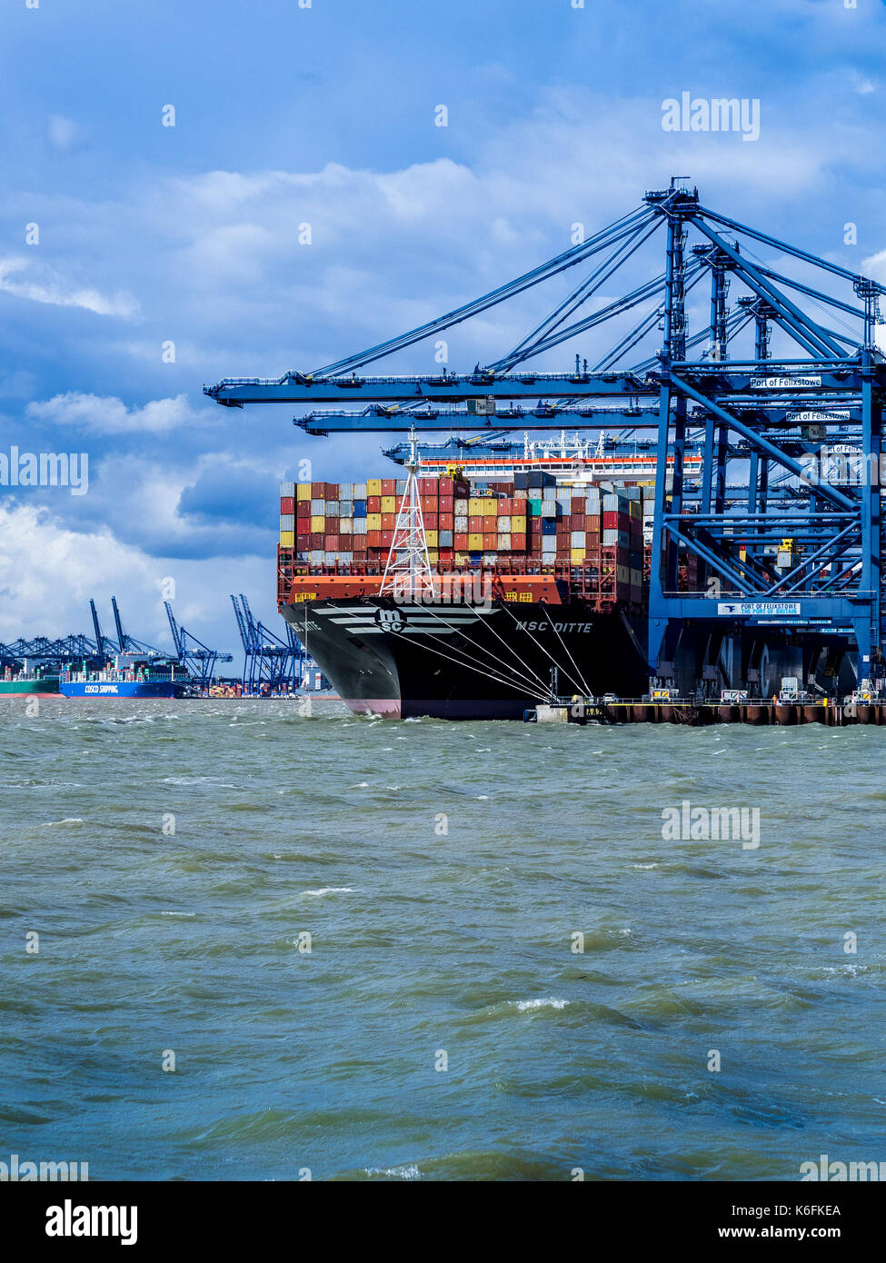 International Trade - containers being loaded and unloaded onto ...