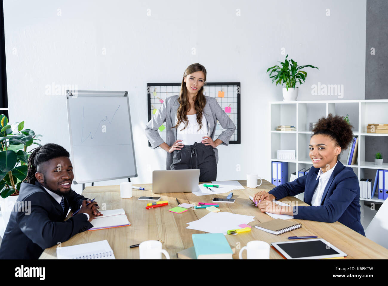 smiling multicultural business people Stock Photo - Alamy