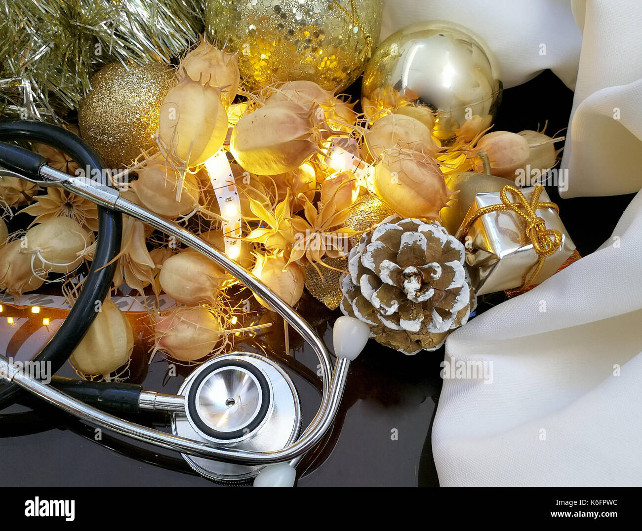 Medical Christmas cards with lights and cone pines Stock Photo - Alamy
