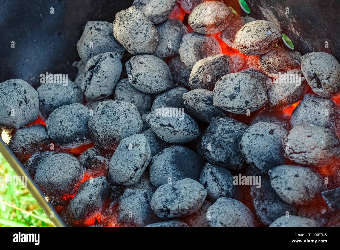 Hot flamed barbecue coal in a grill at summer party Stock Photo - Alamy