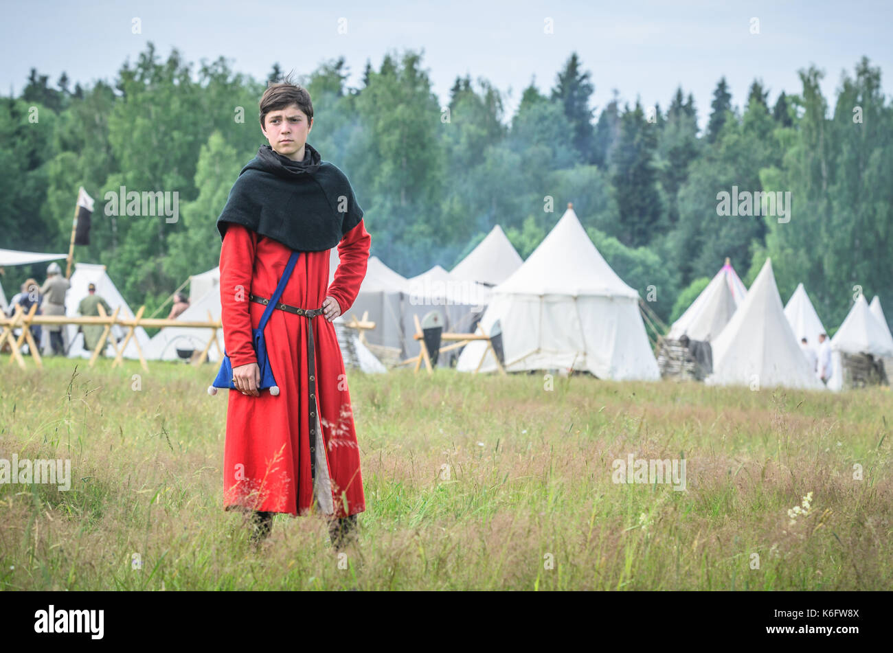 MOSCOW,RUSSIA-June 06,2016: Man in ancient merchant costume stands on ...