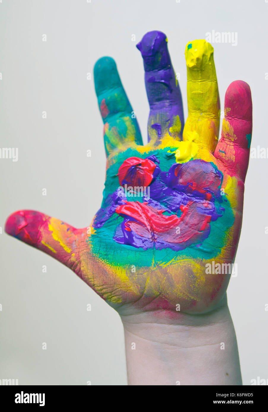 little girl's painted hand Stock Photo - Alamy