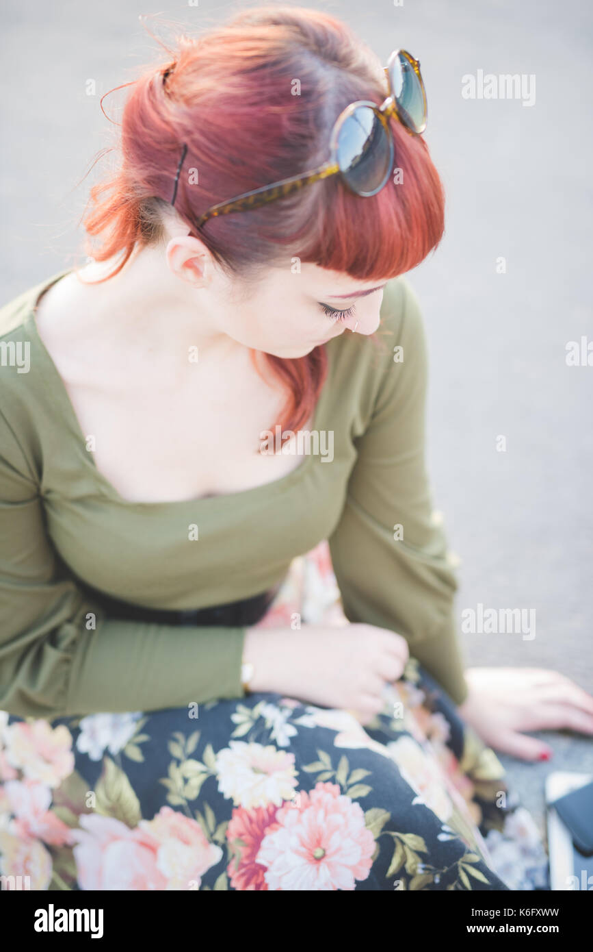 Young woman posing head down hi-res stock photography and images - Alamy
