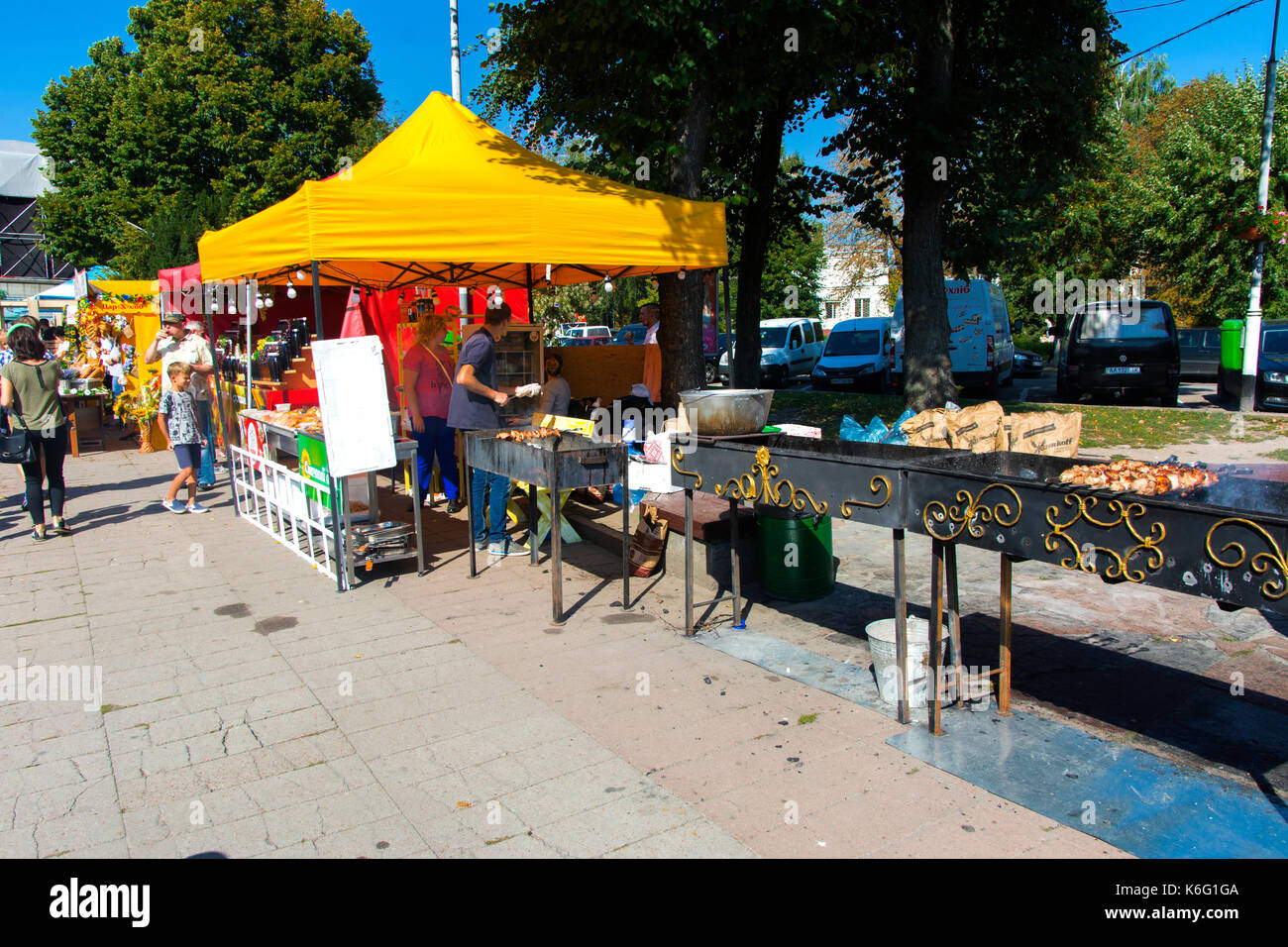 Street trading with goods from the counter at the celebration. Day of ...