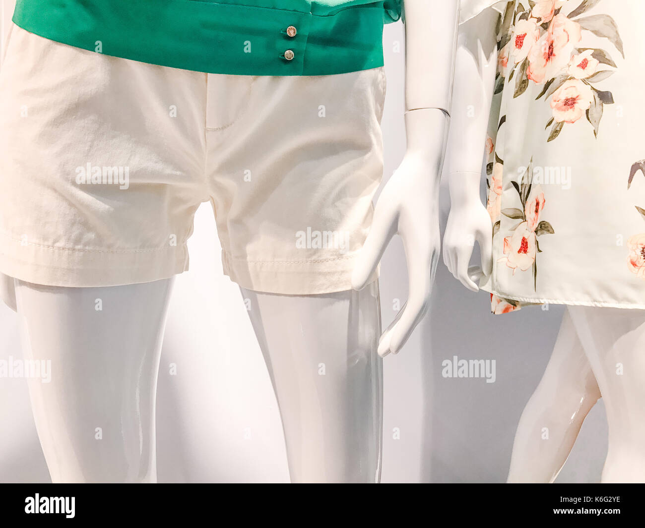 Mannequin in the window of a clothing store Stock Photo - Alamy