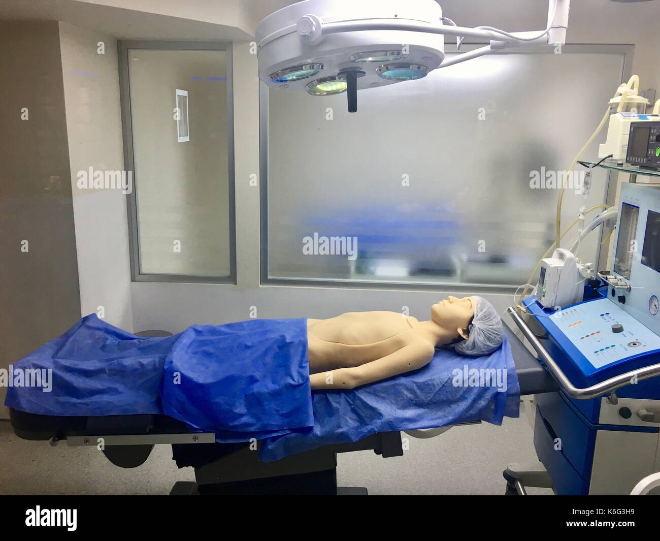 artificial wax model in modern operating room with Defibrillator ...