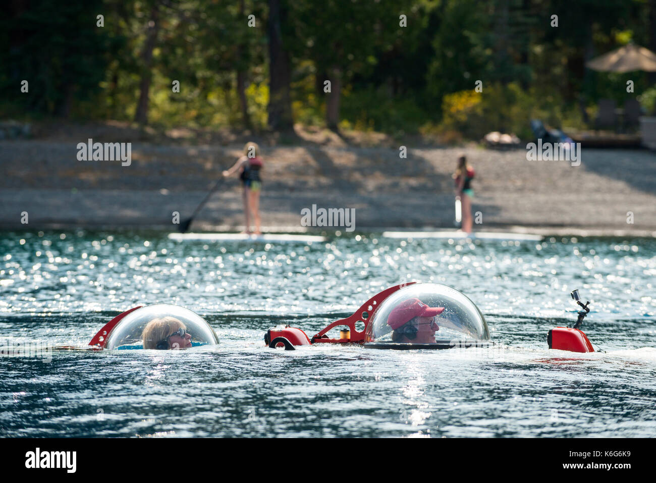 Prototype two-man personal submarine partially submerged in Lake Tahoe ...