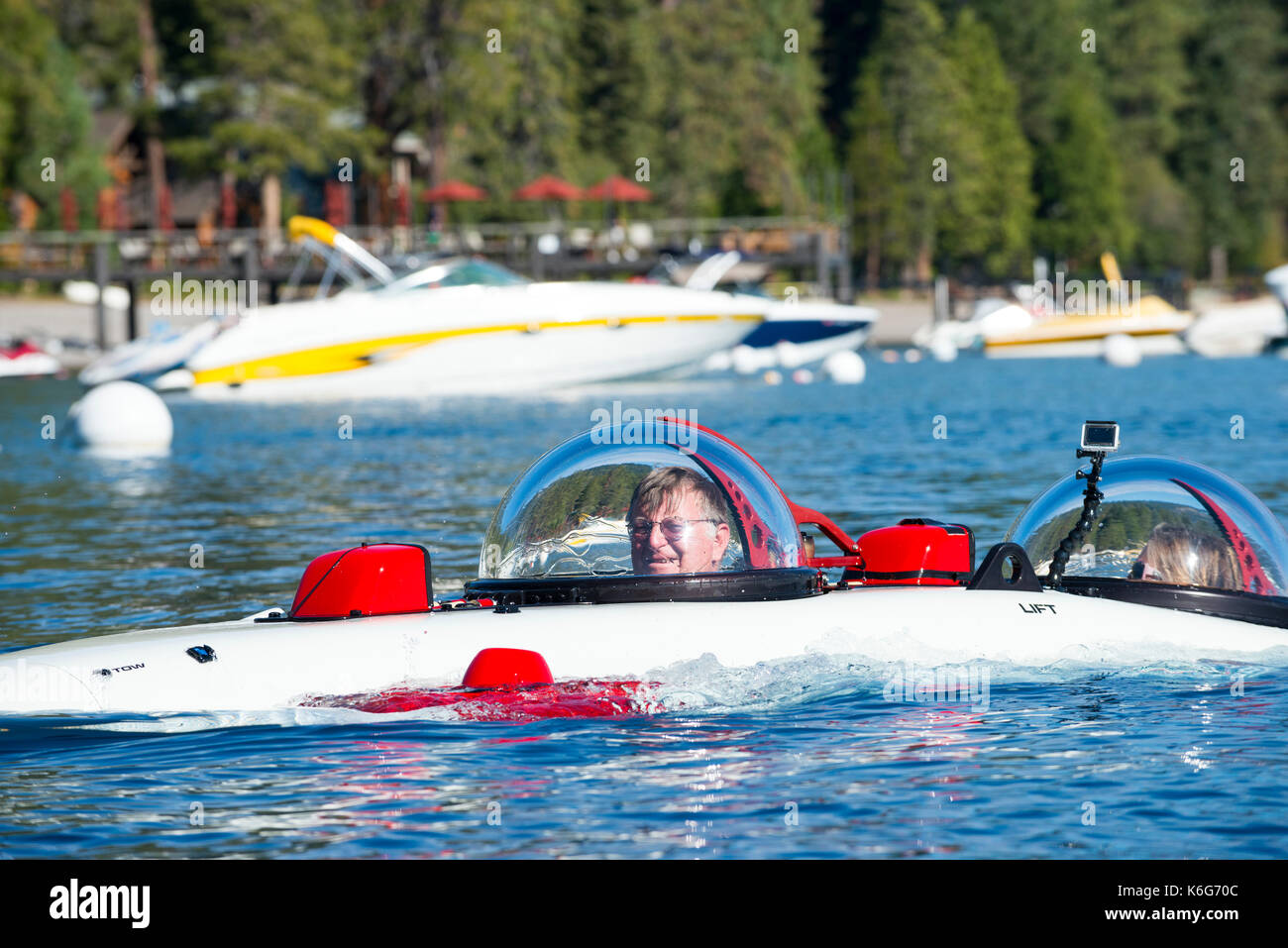 Prototype two-man personal submarine partially submerged in Lake Tahoe ...