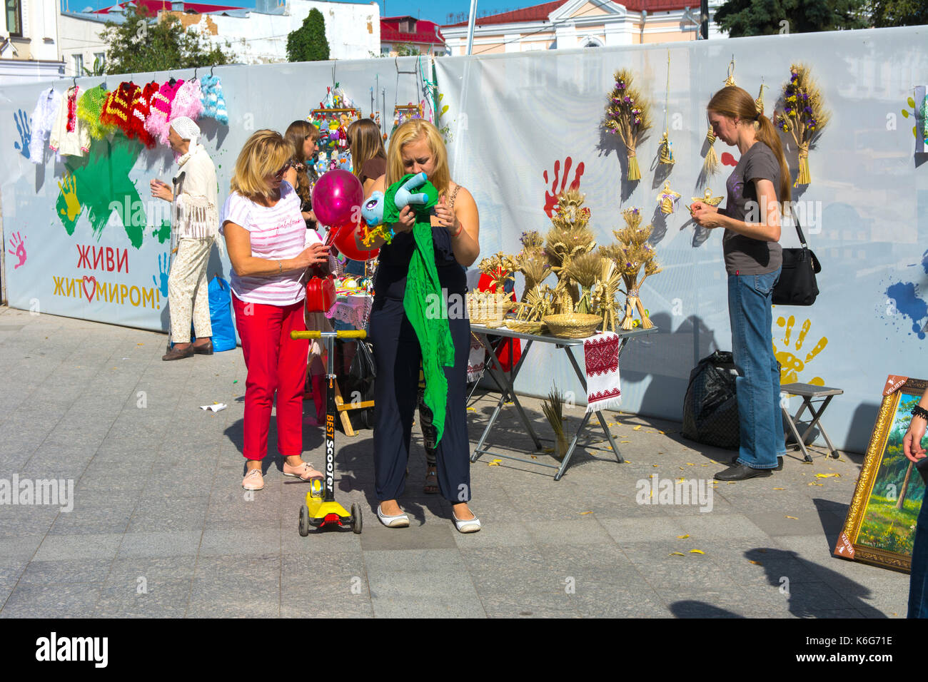 Street trading with goods from the counter at the celebration. Day of ...