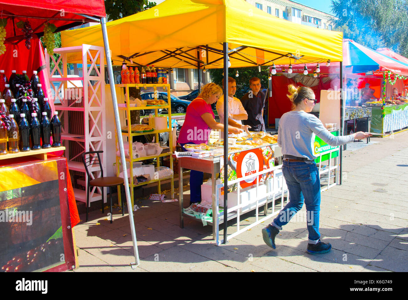 Street trading with goods from the counter at the celebration. Day of ...