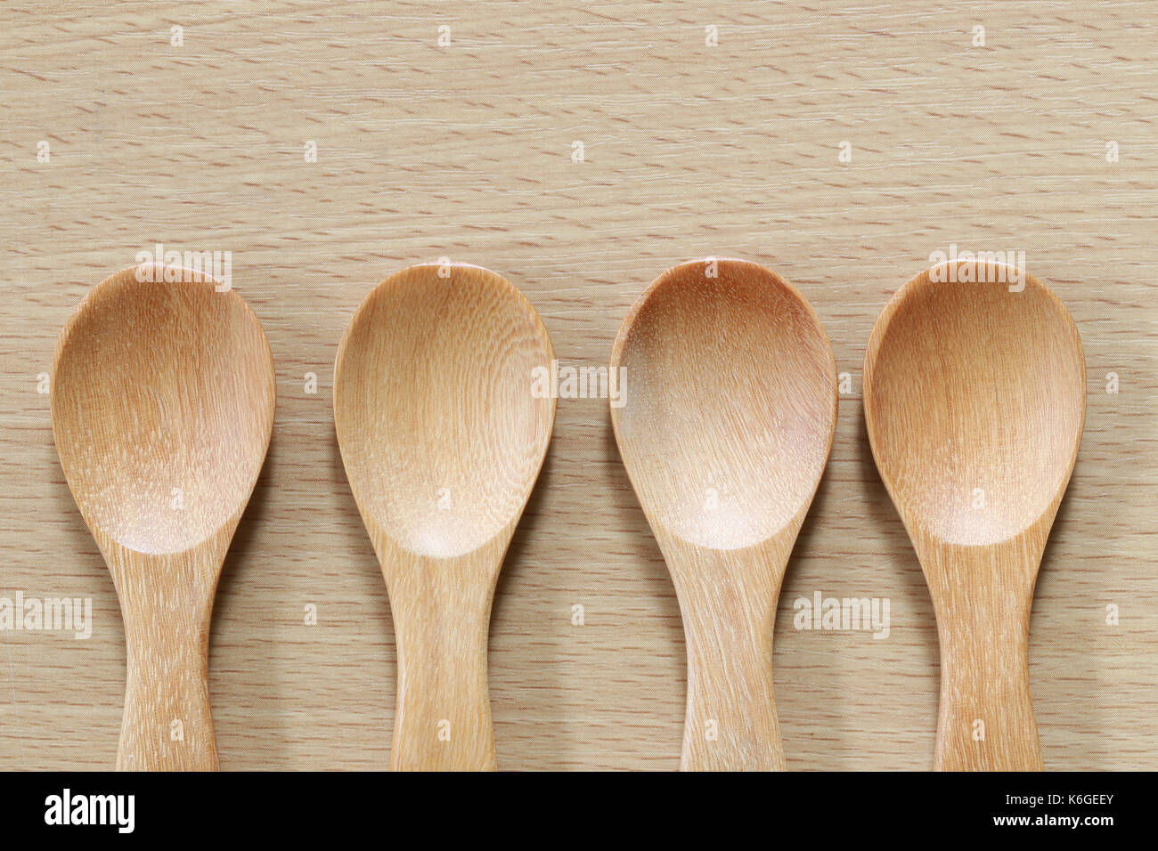 Empty wooden spoon on wood floor in food design concept Stock Photo - Alamy