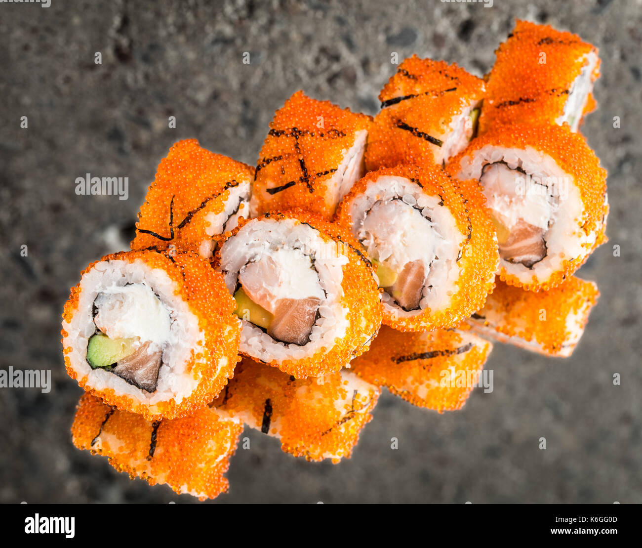 California roll made with tobiko, shrimp, salmon Stock Photo - Alamy