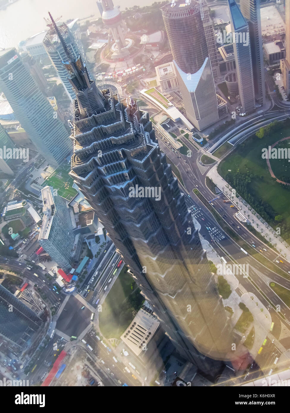 The cityscape of Shanghai with the Jin Mao Tower in the foreground ...
