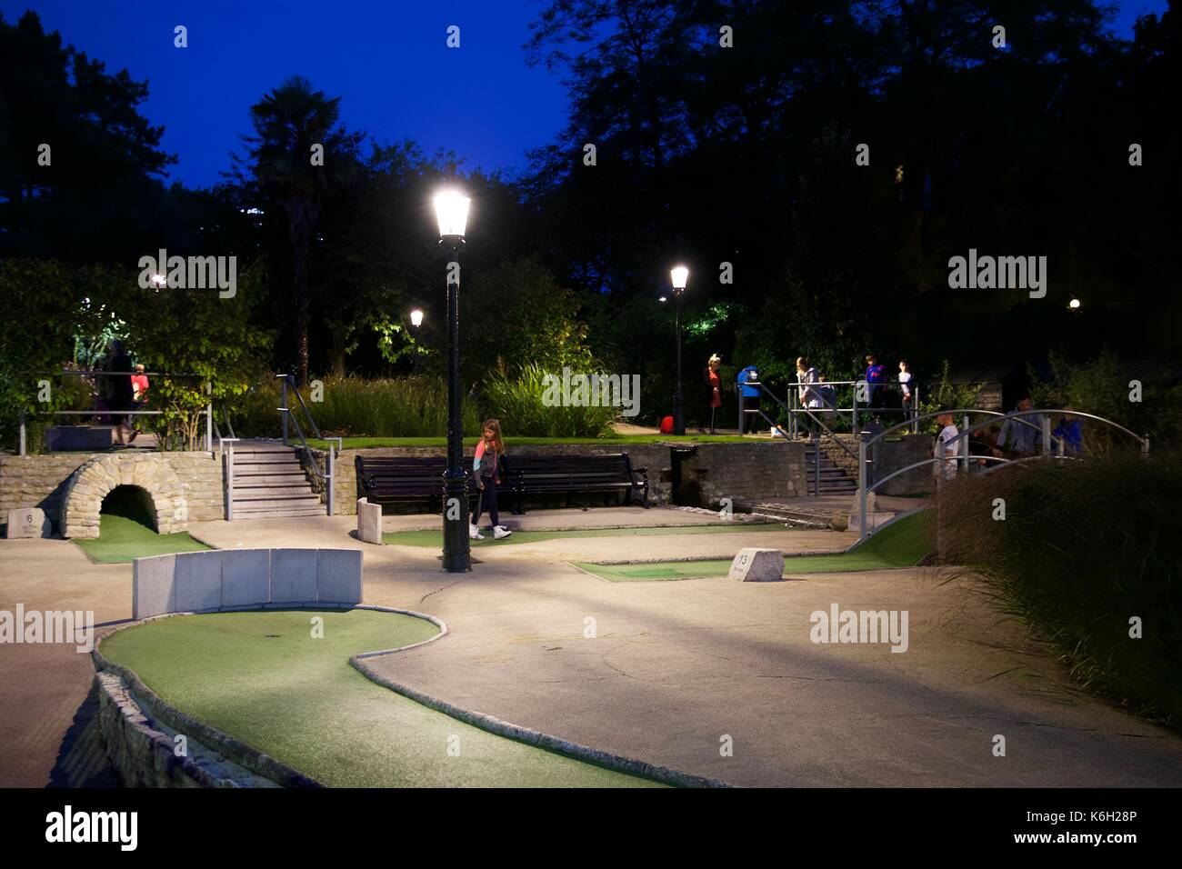 People playing mini golf at Bournemouth Stock Photo - Alamy