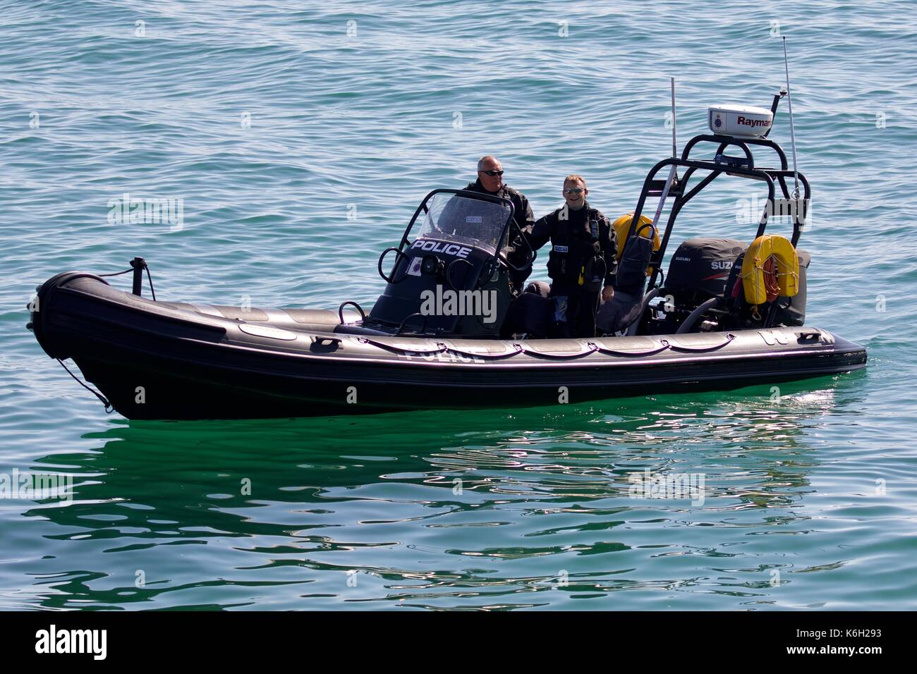 Dorset Police Marine patrolling the coastline Stock Photo - Alamy