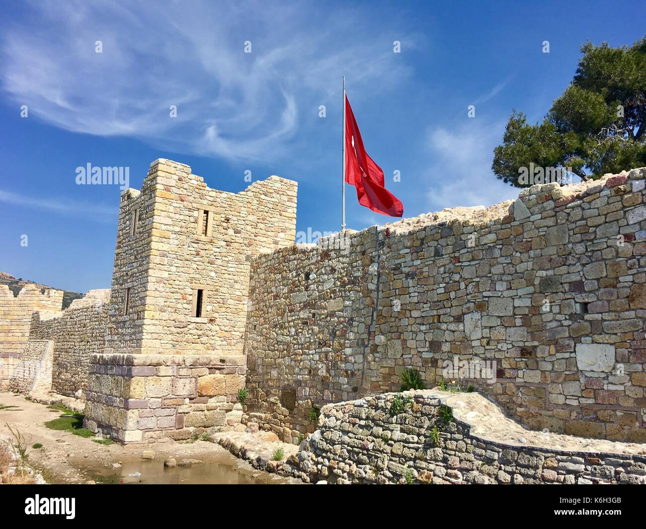 FOÇA, TURKEY - APRIL 29, 2017 : Foca castle of old Foca, Izmir. Due to ...