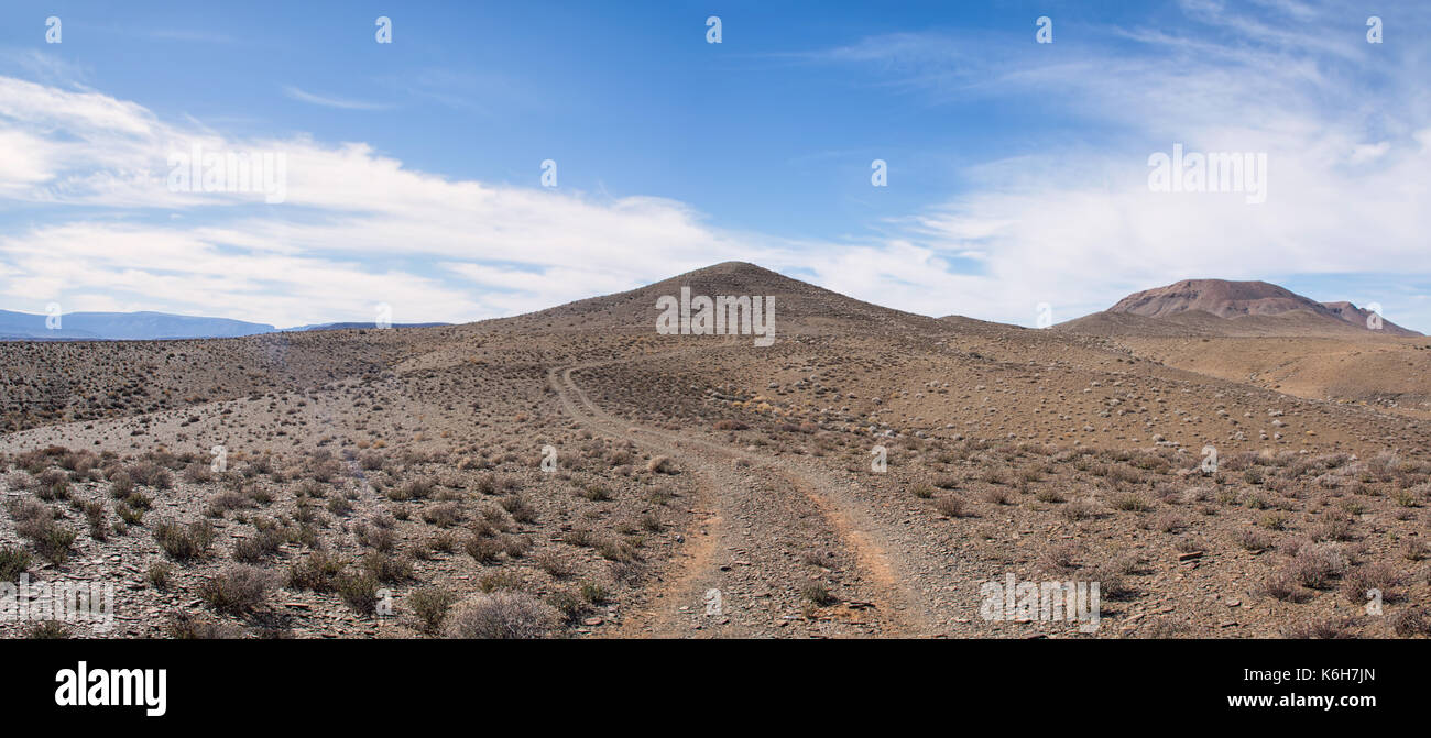 Gravel track through desert landscape hi-res stock photography and ...