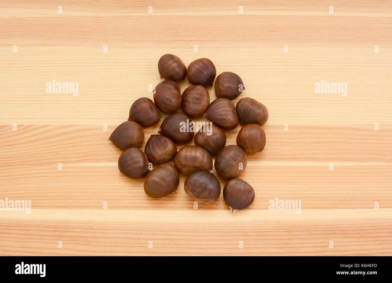 Chestnuts in shells hi-res stock photography and images - Alamy