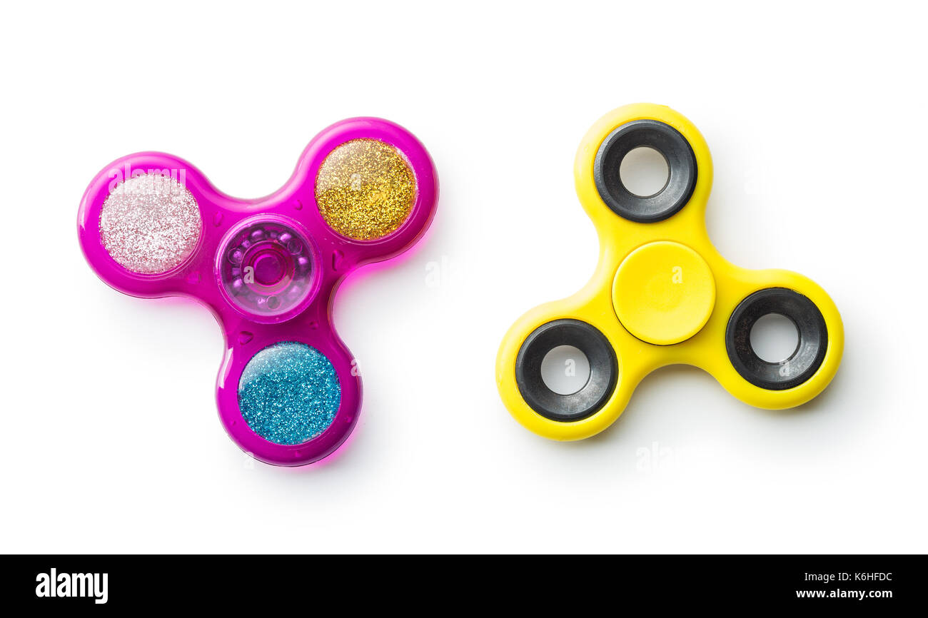 Two fidget finger spinner stress isolated on white background. Top view ...