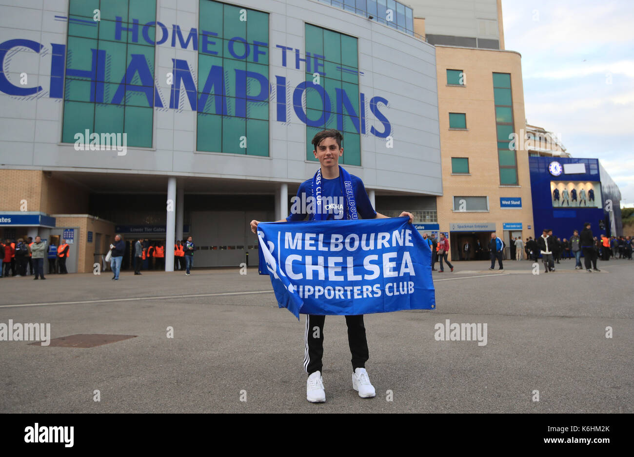 A Chelsea fan holds up a flag prior to the the UEFA Champions League ...