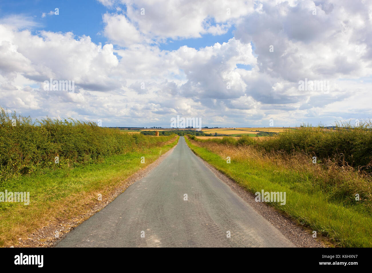 a small english country road in beautiful yorkshire wolds scenery at ...
