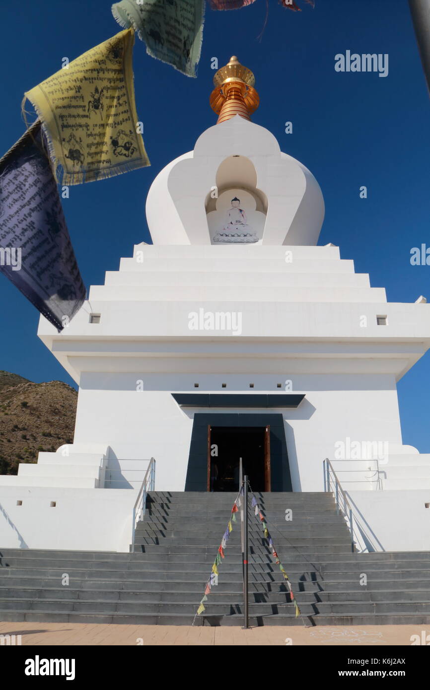 Facade of Buddhist temple and colored pennants Stock Photo - Alamy