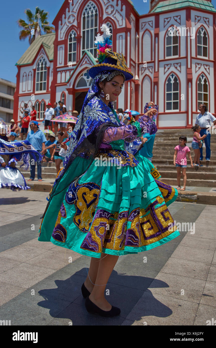 Members of a Waca Waca dance group in ornate costume performing at the ...