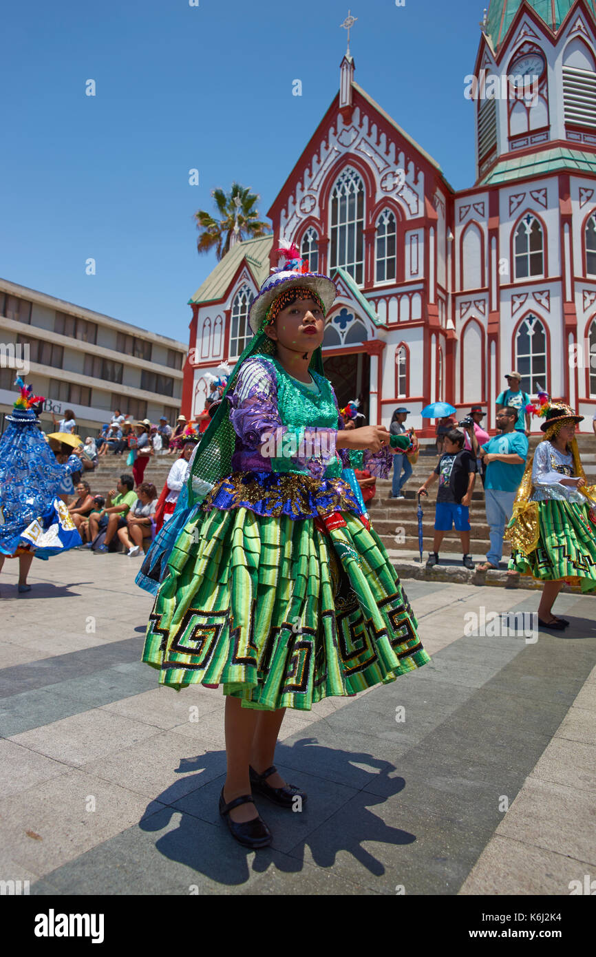 Members of a Waca Waca dance group in ornate costume performing at the ...