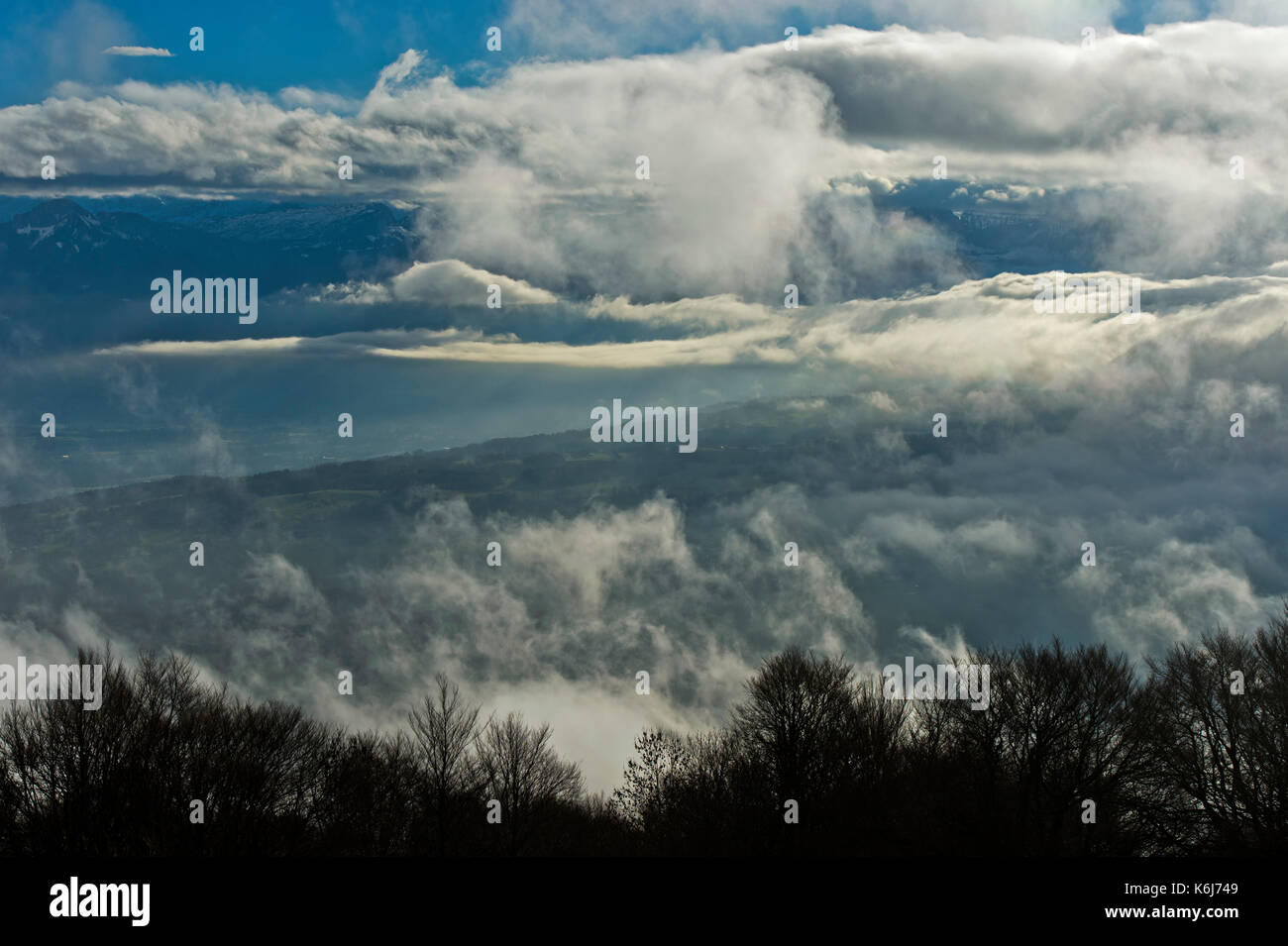 Drifting clouds and fog in the Arve Valley of the Savoy Prealps near ...