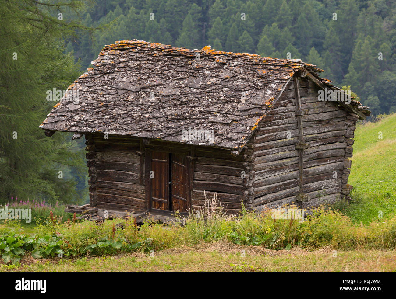 LA SAGE, SWITZERLAND - Swiss wooden barn in village of La Sage, in the ...
