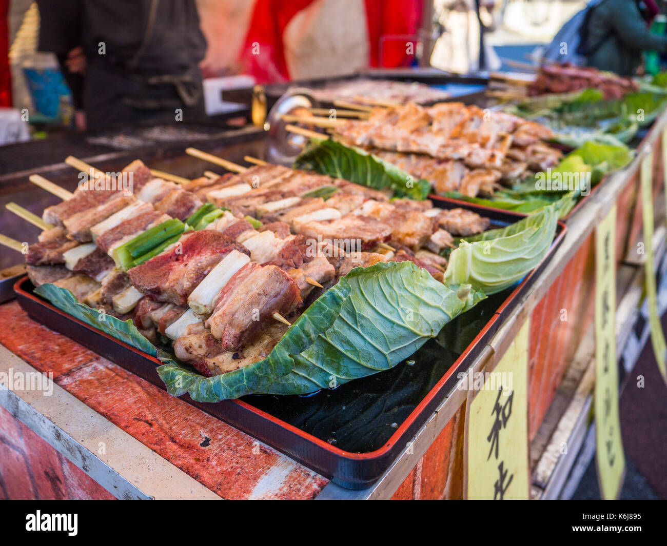 Close up of Japanese food in a stick in Tokyo Stock Photo - Alamy