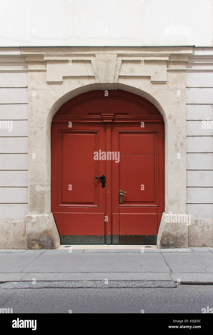 Double retro wooden door on old building Stock Photo - Alamy