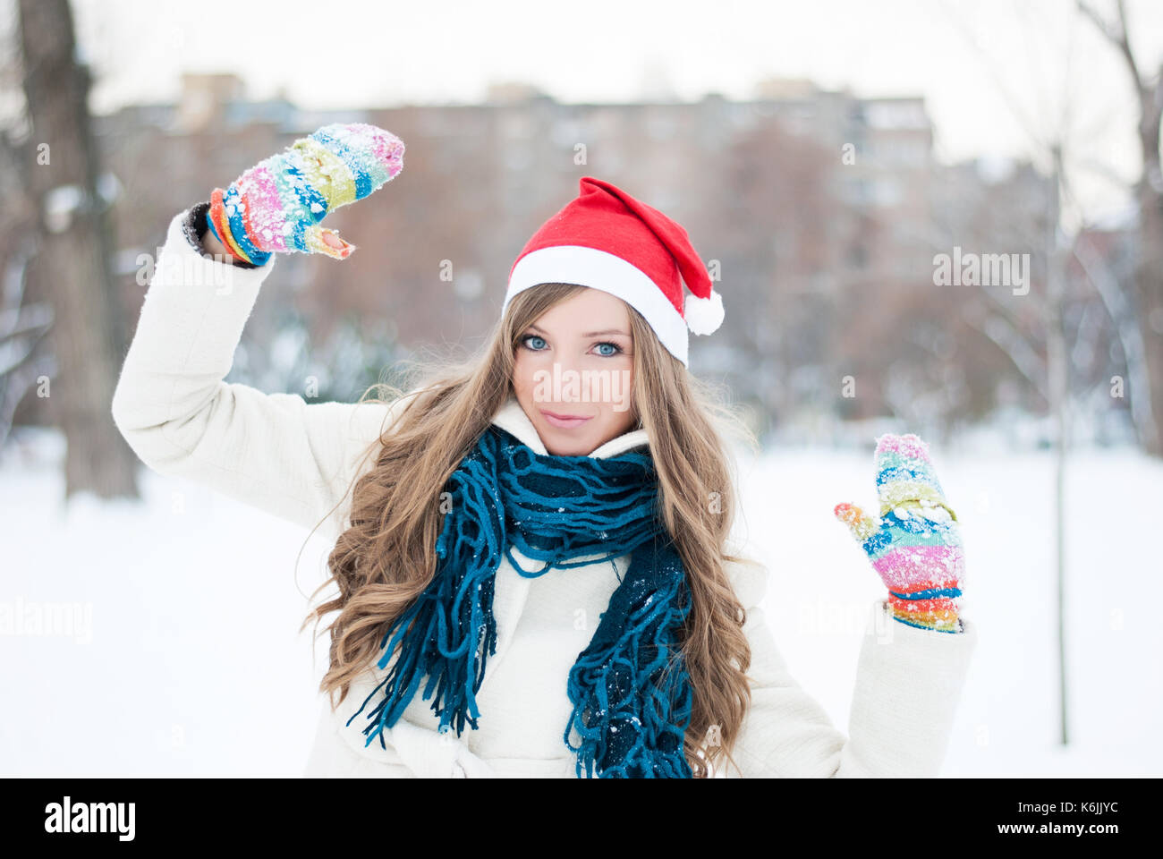 beautiful girl posing in the snow Stock Photo - Alamy
