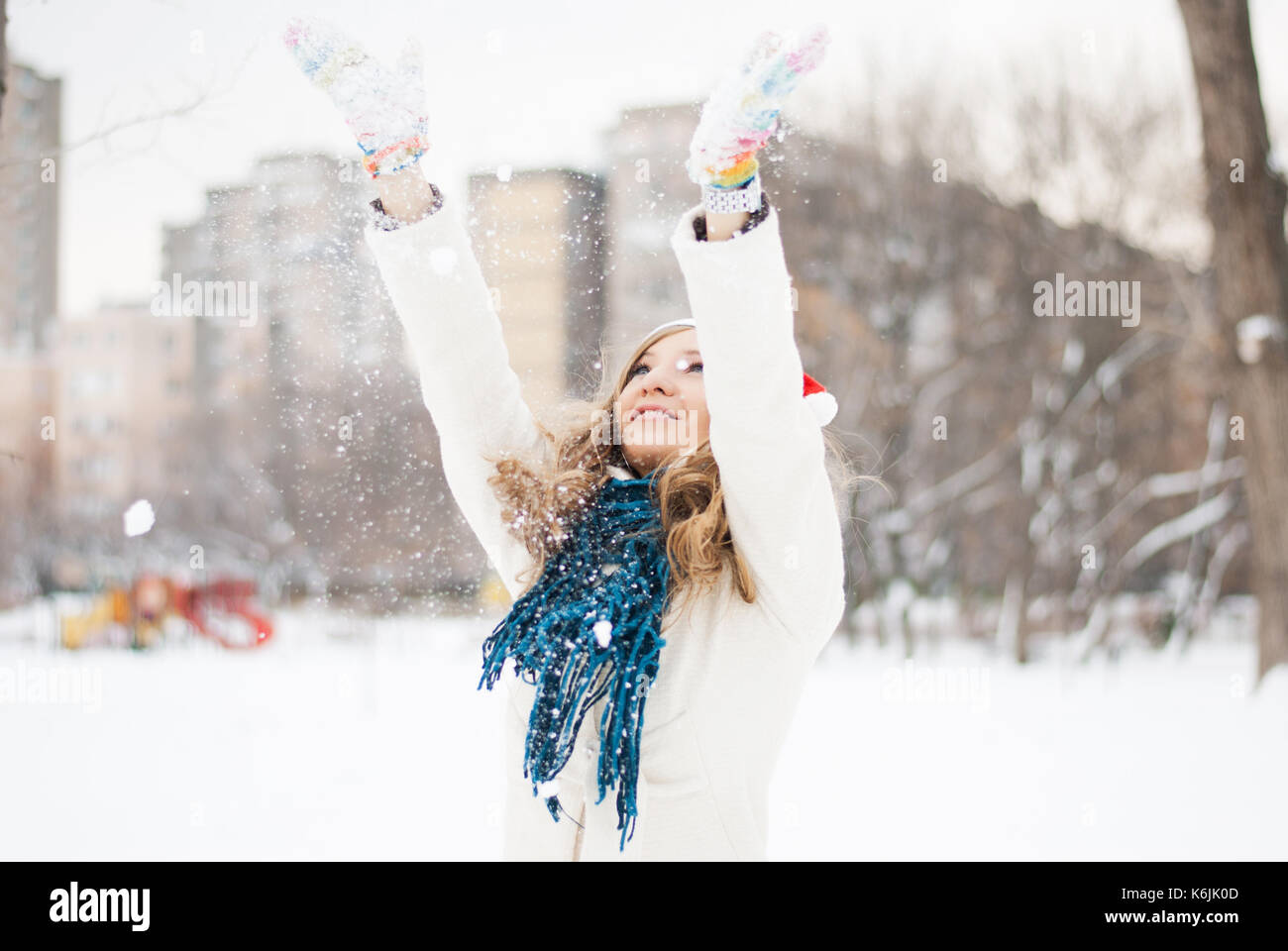 Beautiful girl posing in the snow Stock Photo - Alamy