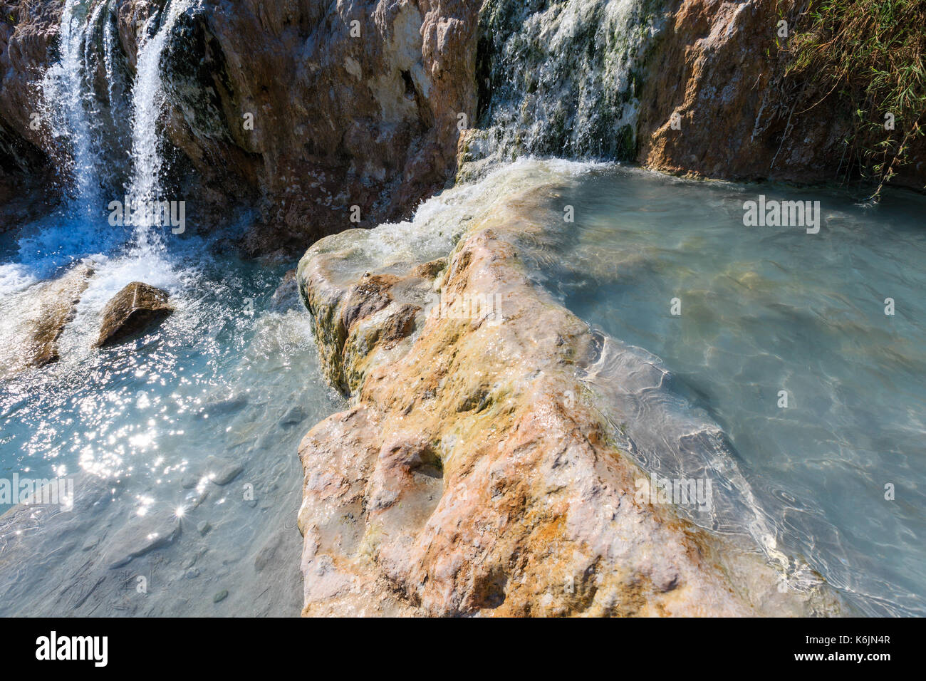 Natural spa with waterfalls and hot springs at Saturnia thermal baths ...