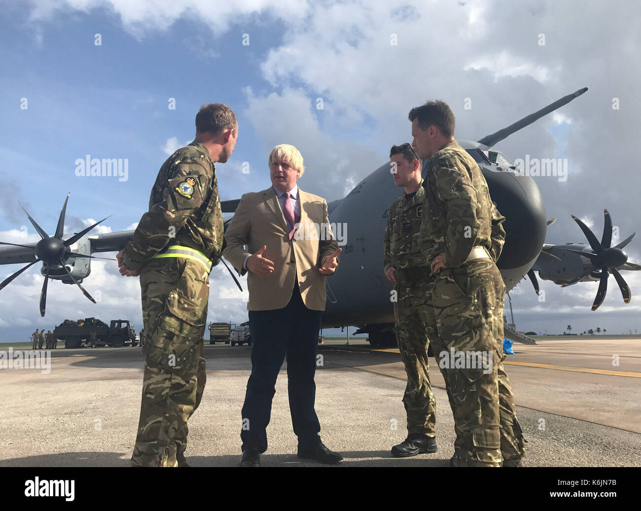 Foreign Secretary Boris Johnson talks to the pilots of an RAF A400M ...