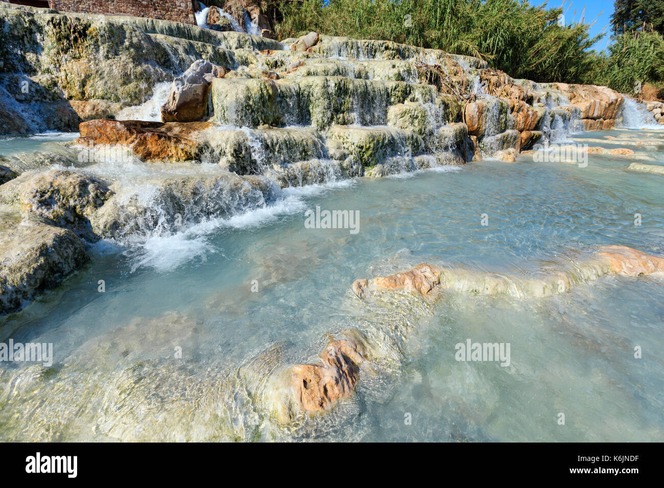 Natural spa with waterfalls and hot springs at Saturnia thermal baths ...