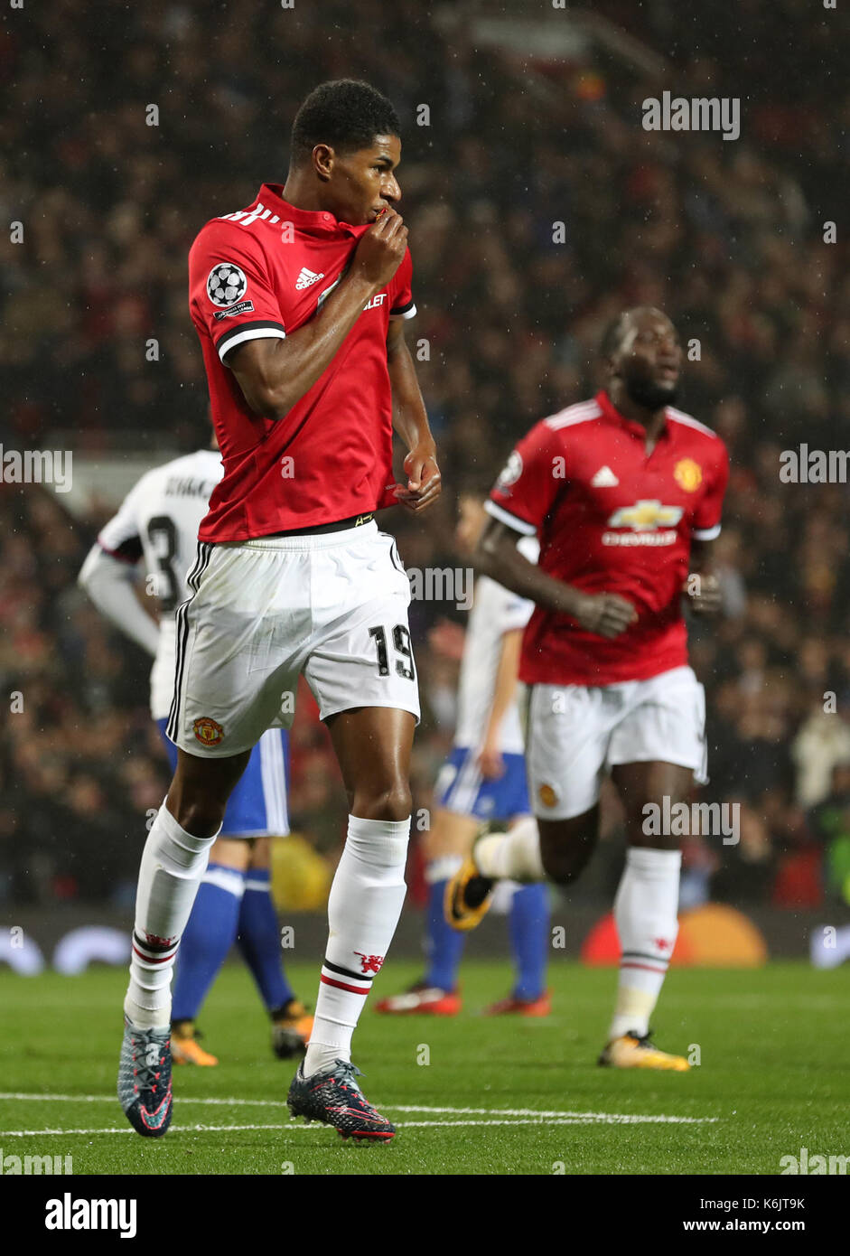 Manchester United's Marcus Rashford celebrates scoring his side's third ...