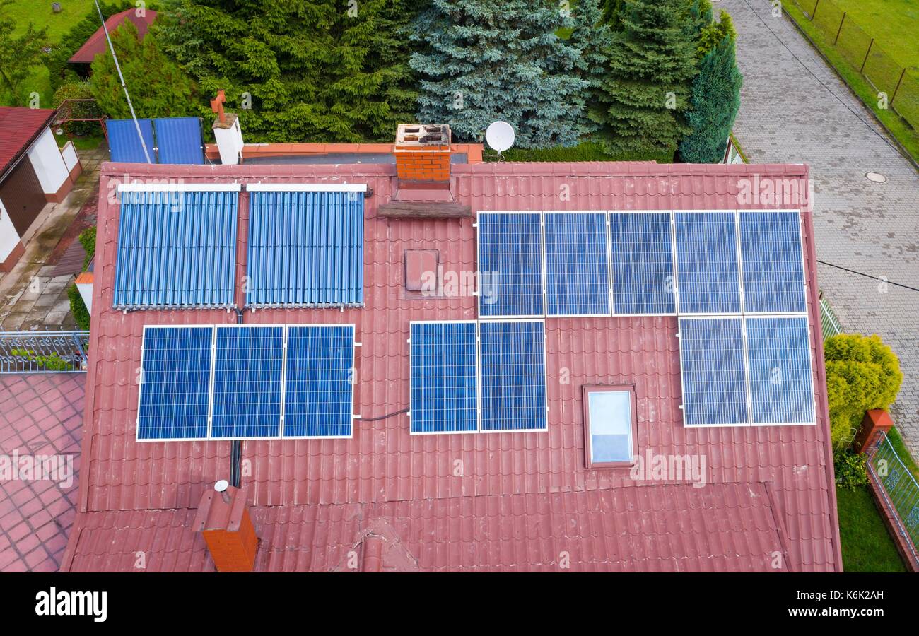 Aerial view of photovoltaic solar panels on house roof Stock Photo - Alamy