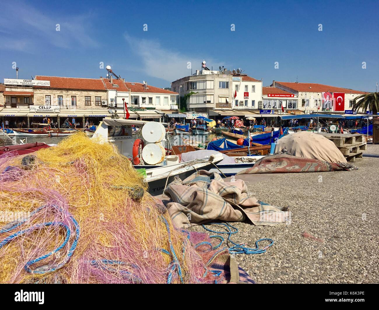 Harbour and boat port view of old Foca, Izmir. Due to seals floating in ...