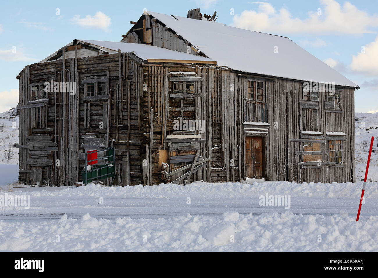 Old wooden plank hut-chipped walls of barn-abandoned ruined cabin-outer ...