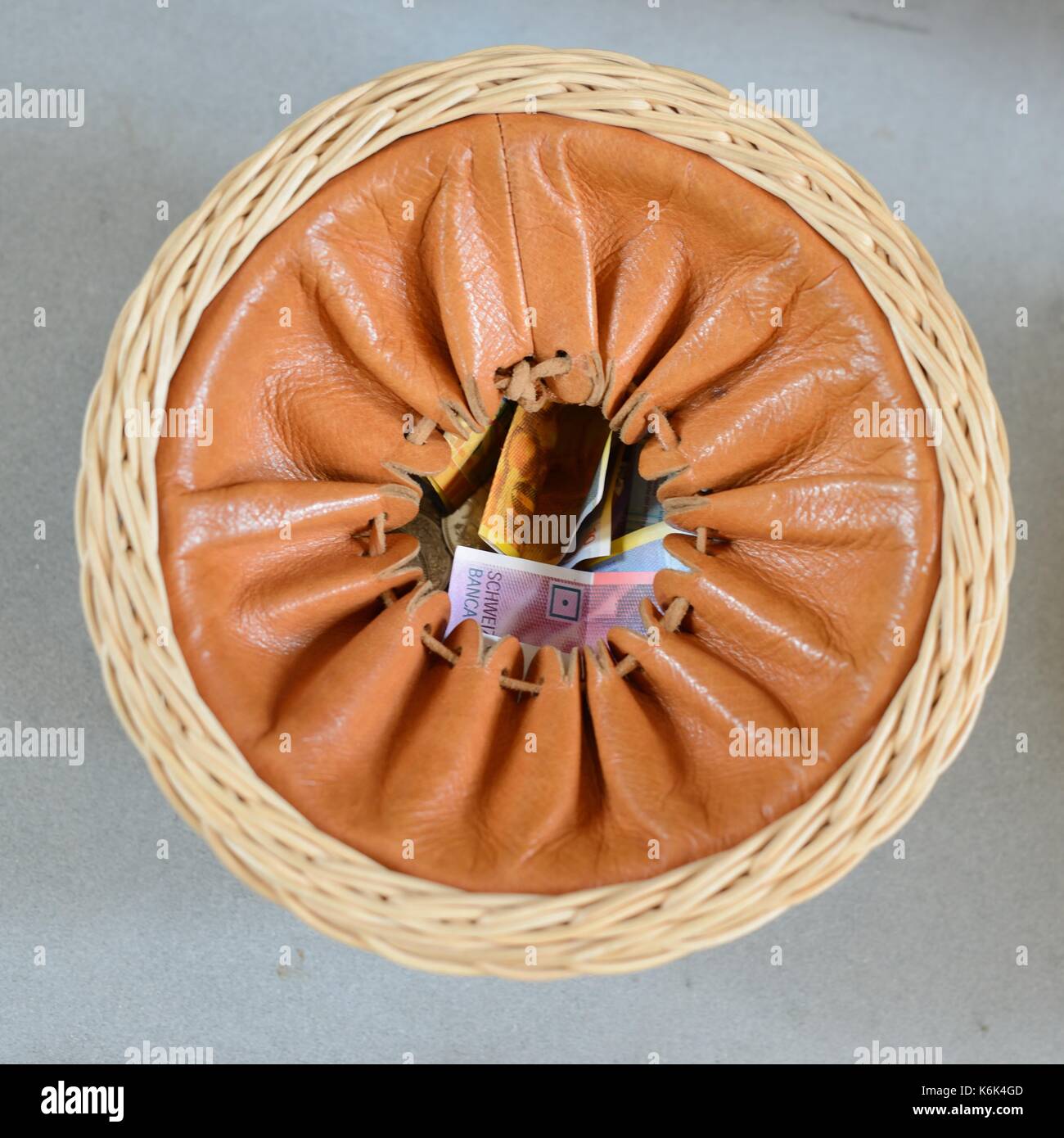 Donated money in a church Stock Photo - Alamy