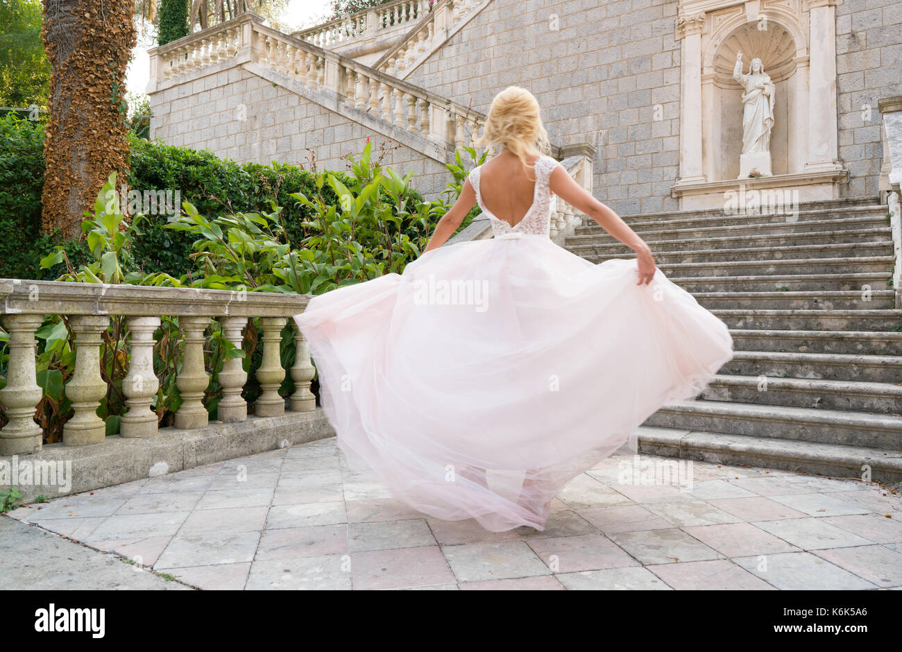 bride in a dress is spinning in a dance Stock Photo - Alamy