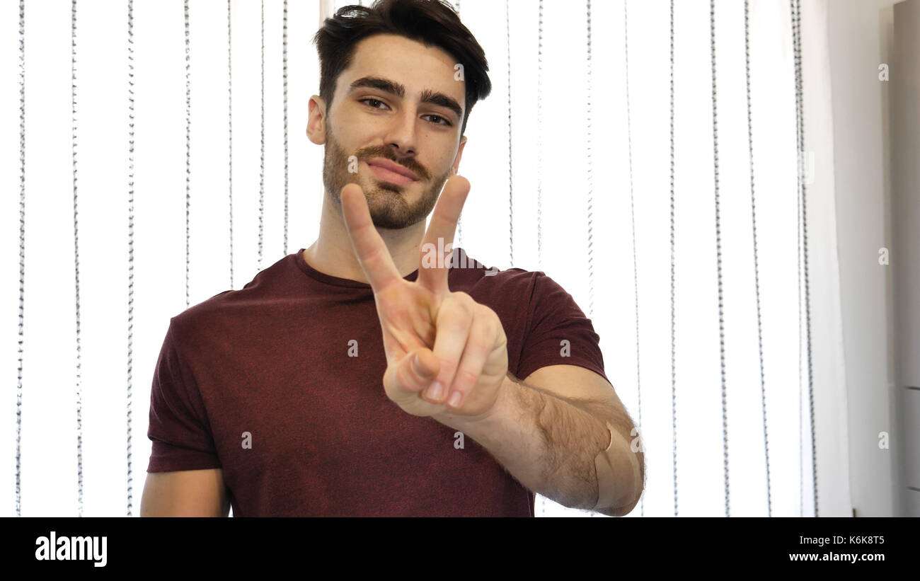 Man Doing Peace Sign High Resolution Stock Photography and Images - Alamy