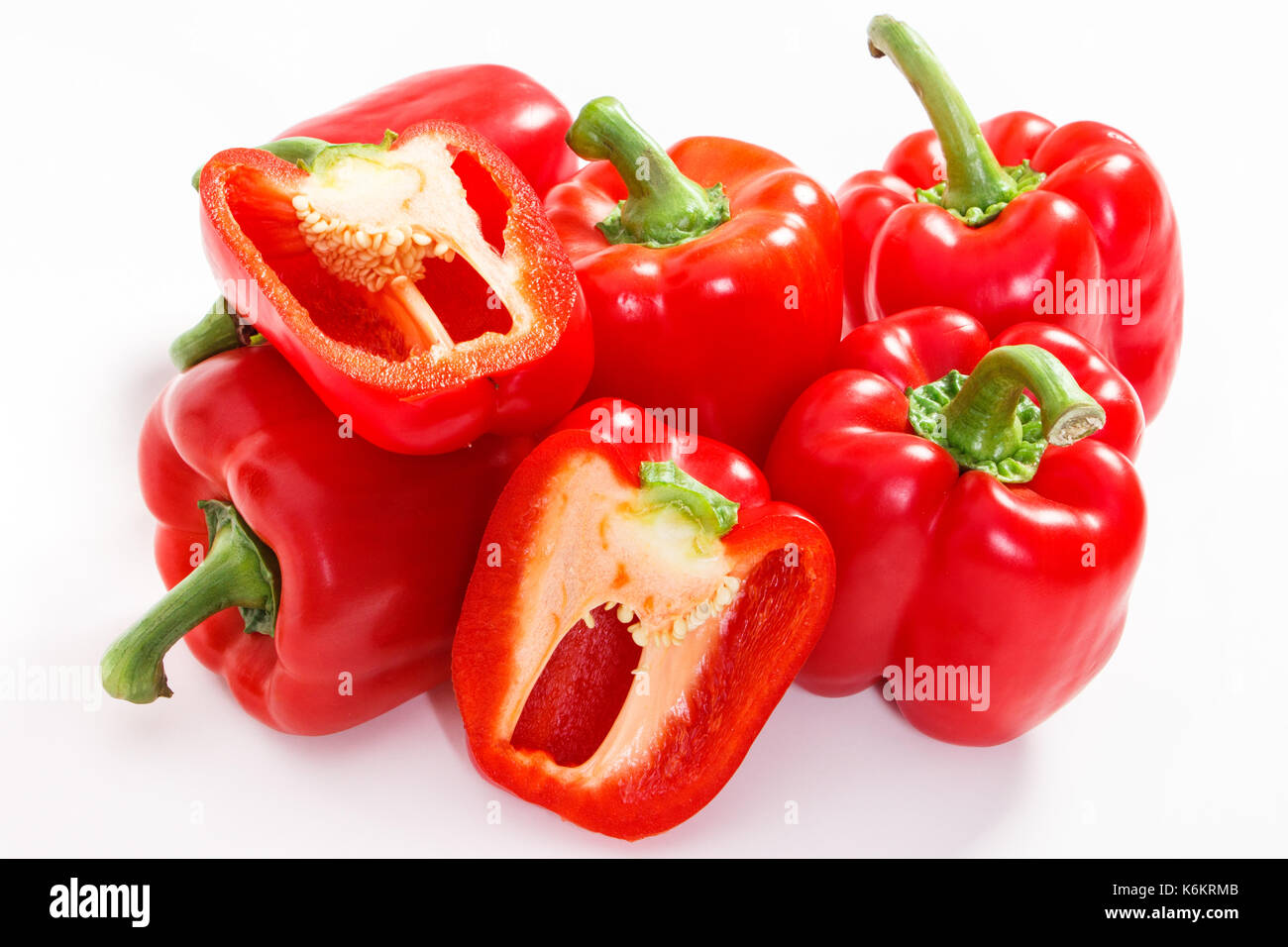 Red ripe peppers lying on white background, concept of healthy ...