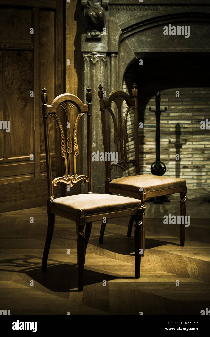 Two antique chairs in an empty room Stock Photo - Alamy