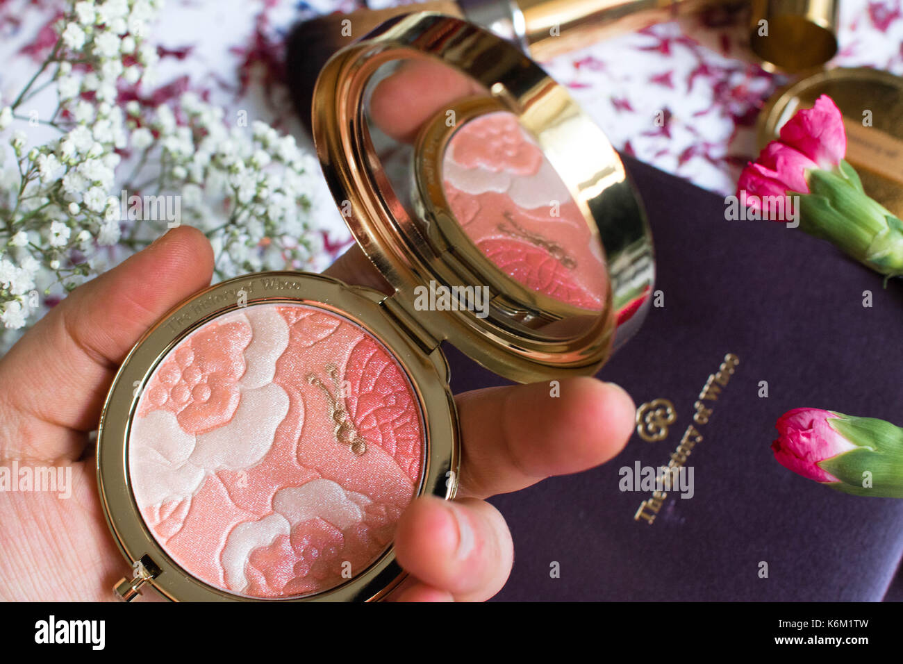 Beautiful blusher with butterfly detail and shimmer with flowers on a ...