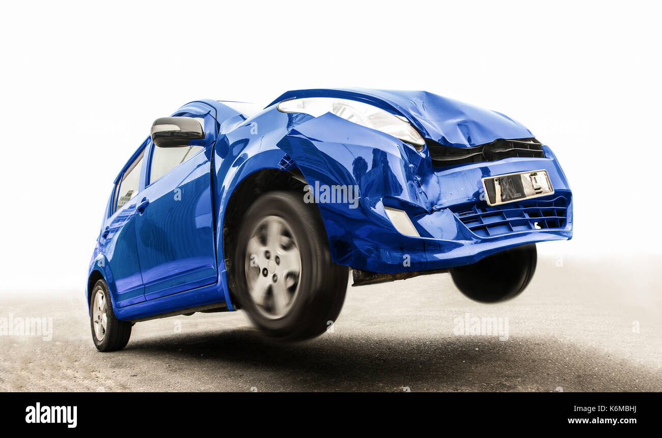 The blue car on the road has damaged the front. Traffic accident of a ...