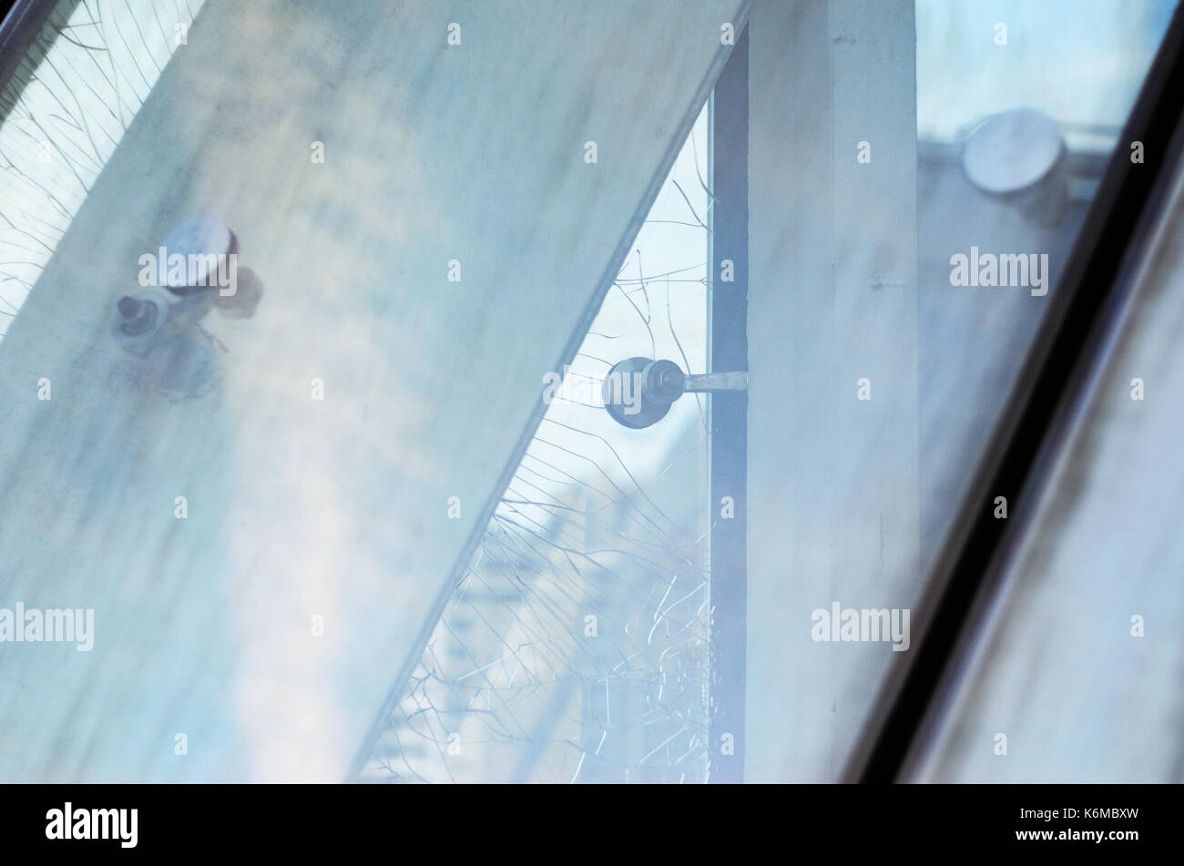 Fastening of Glass on the Facade Close-Up. Spider facade fixing system ...